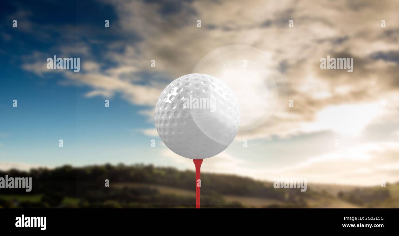 Composition of golf ball on red tee over landscape Stock Photo - Alamy
