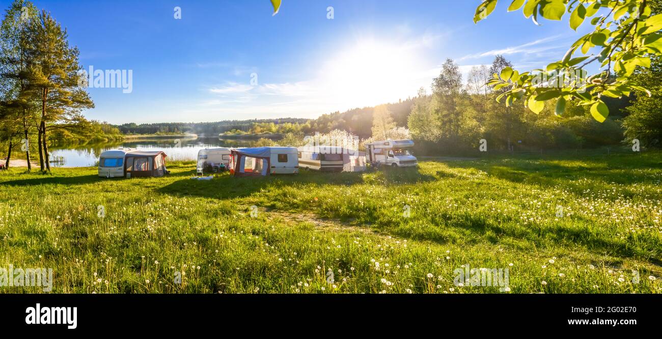 Family with caravan on camping site hi-res stock photography and images ...