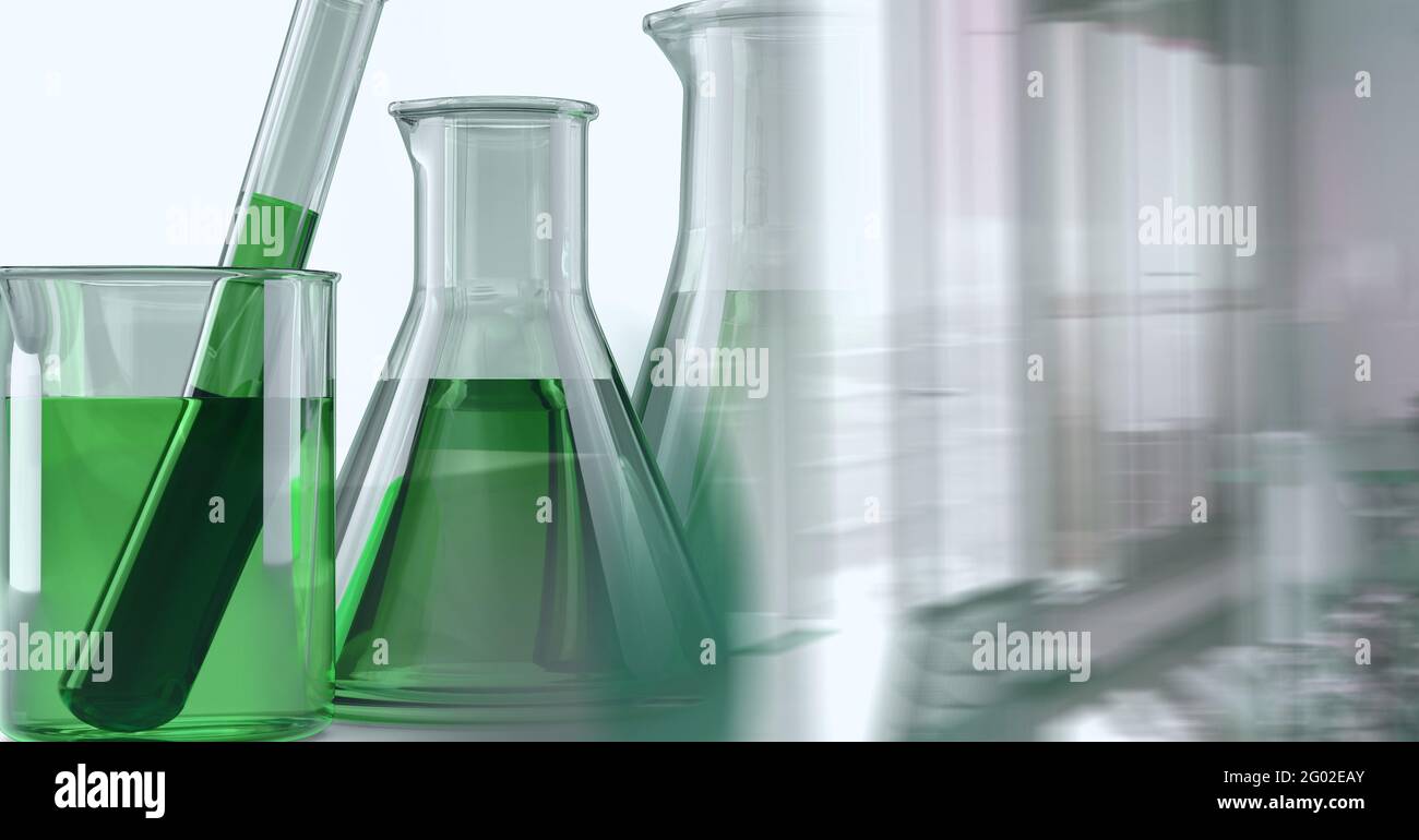 Composition of laboratory test tube and beakers with green liquid and ...