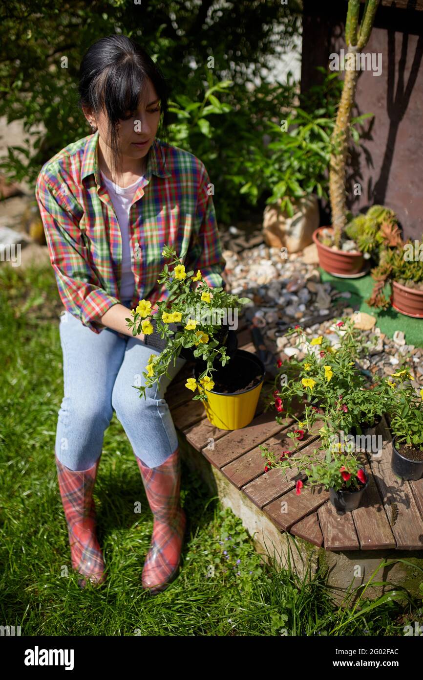 Woman preparing dirt planting hi-res stock photography and images - Alamy