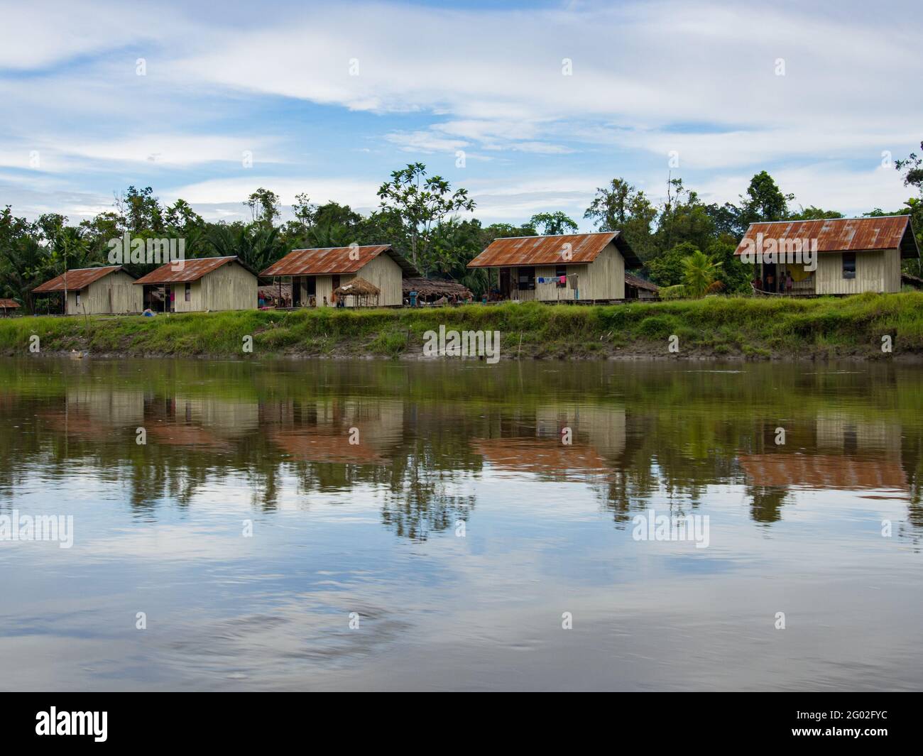 West Papua, Indonesia - January, 2015: Wooden houses on the stilt in ...