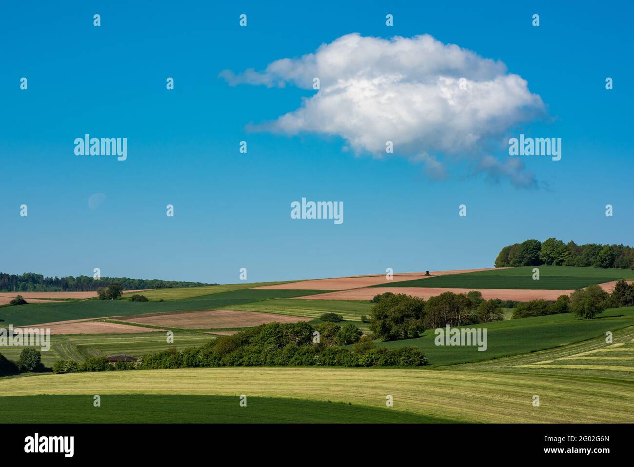 Wallenstein, Germany. 31st May, 2021. Clouds drift over the Knüll ...