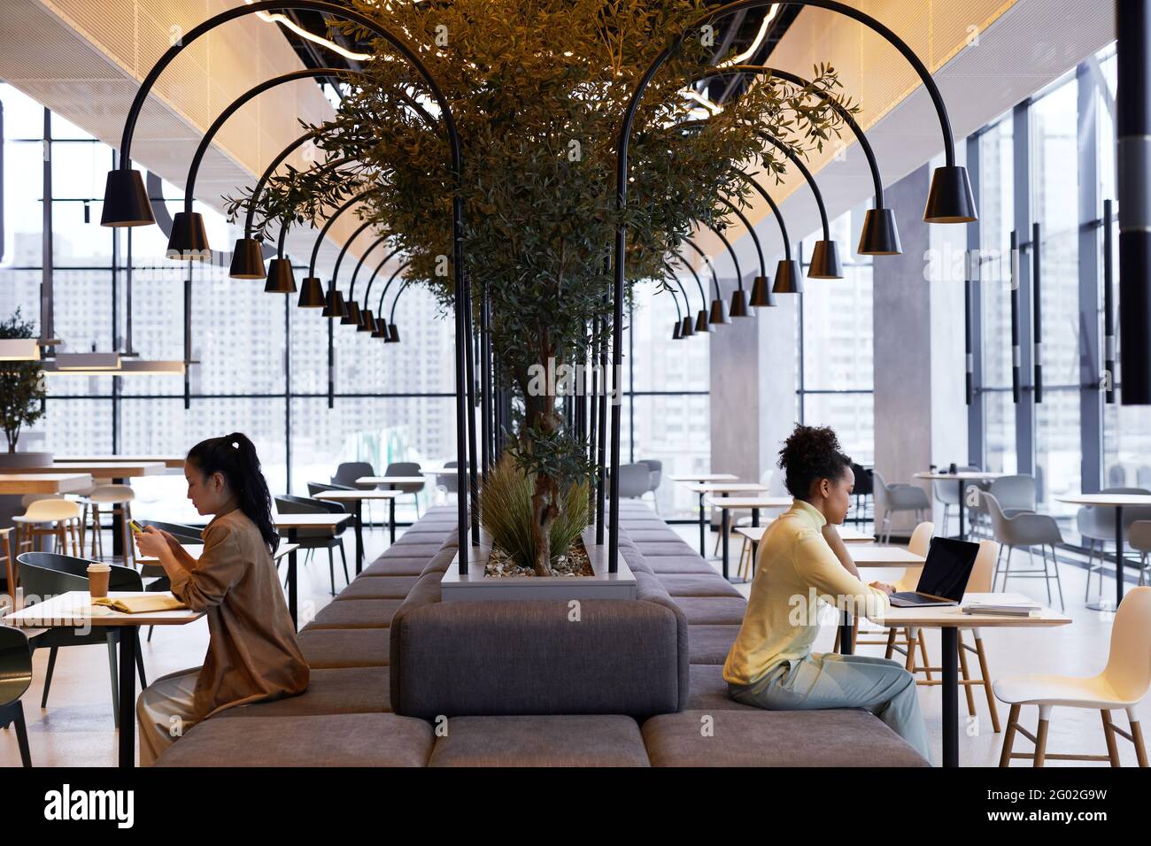 Sitting opposite sides table hi-res stock photography and images - Alamy