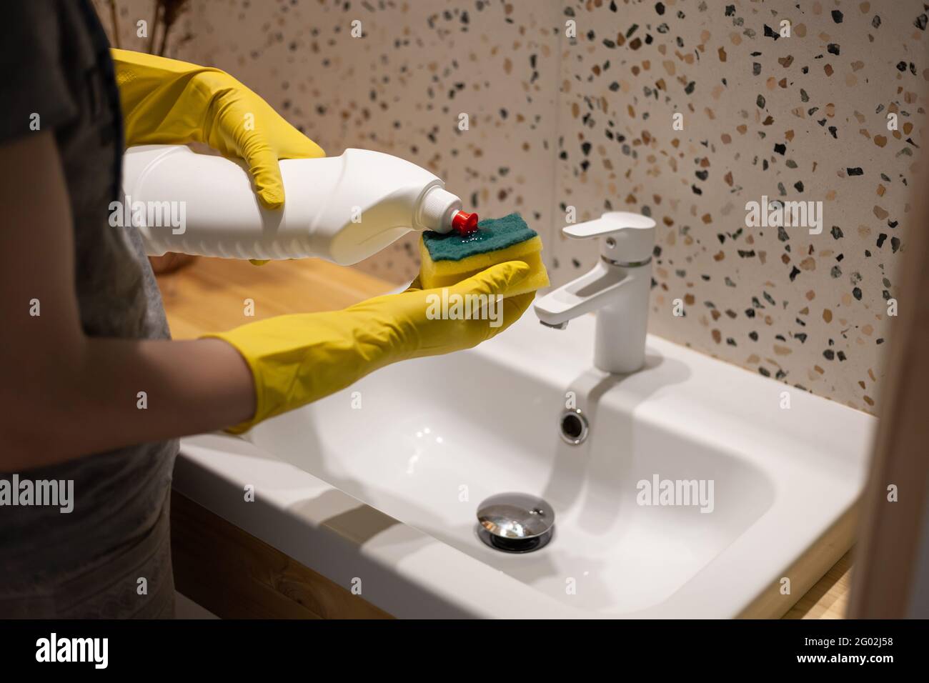 Woman with washbasin hi-res stock photography and images - Alamy