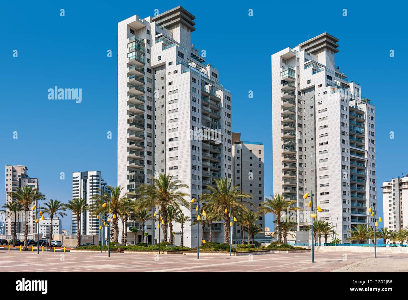 New modern high-rise residential buildings under blue sky in city of ...