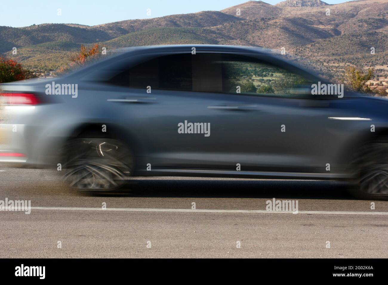 Fast car on the highway. Blurred image Stock Photo - Alamy