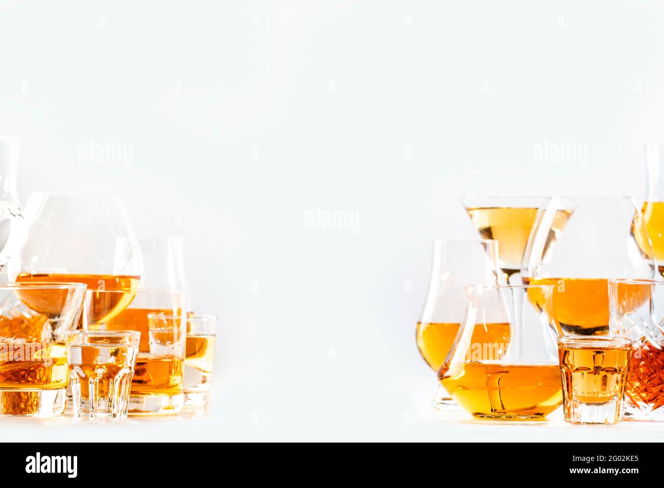 Hard strong alcoholic drinks, spirits and distillates in glasses in ...