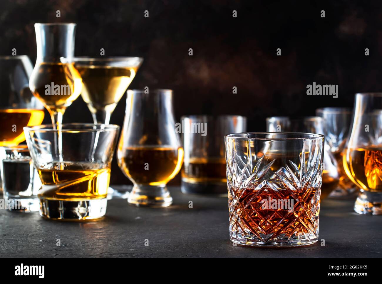 Hard strong alcoholic drinks, spirits and distillates in glasses in ...