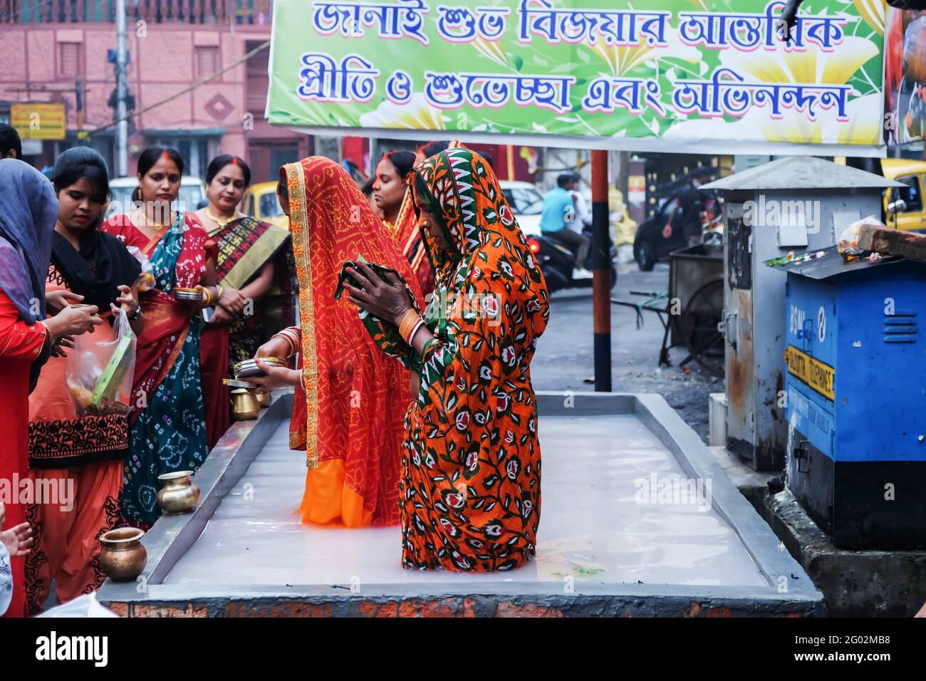 KOLKATA, INDIA - Nov 21, 2020: The Chat puja ritual in the river Ganga ...