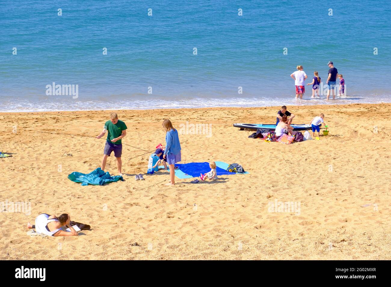 West Bay, Dorset, UK. , . Bank Holiday crowds gather at West Bay in ...