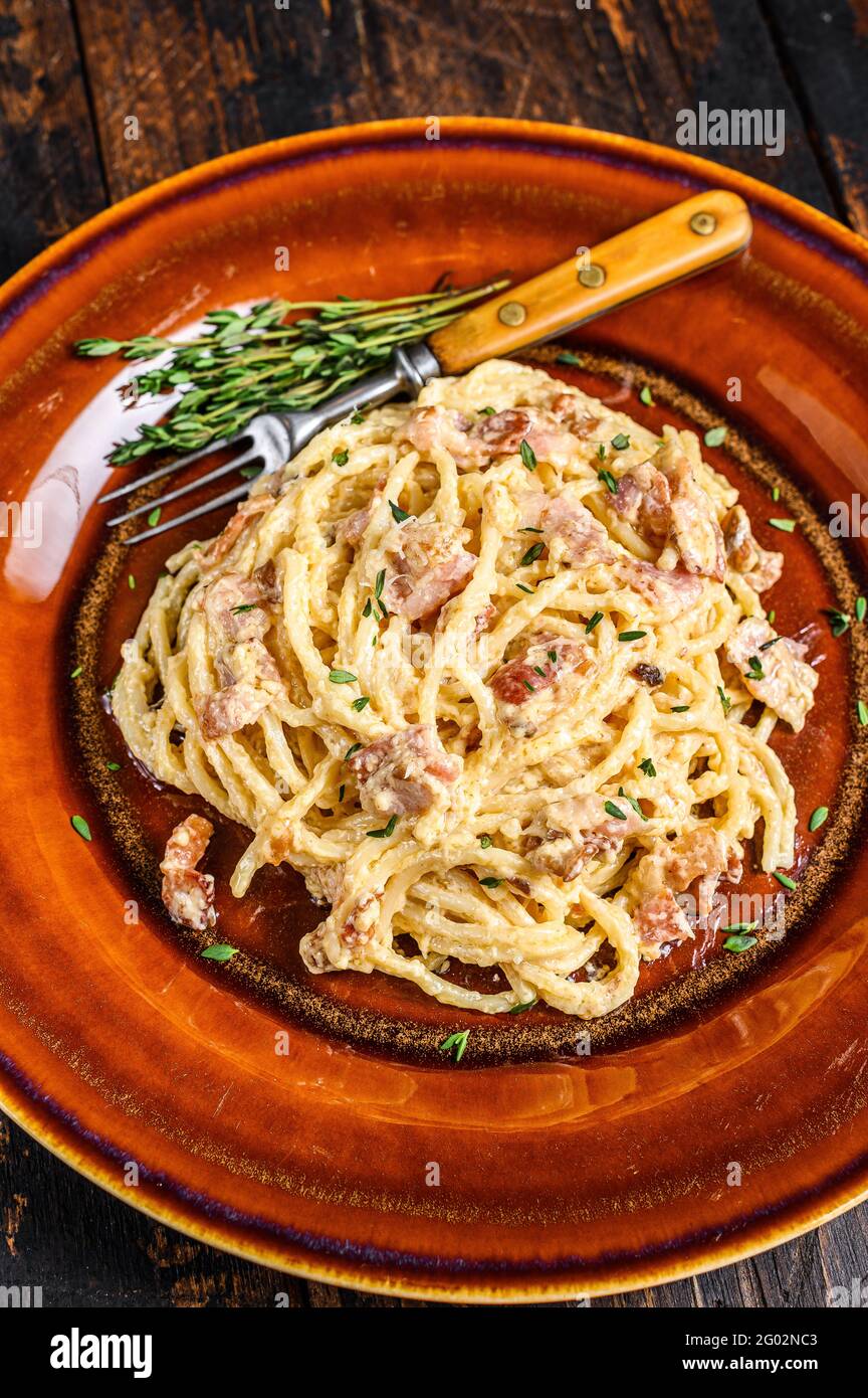 Italian Spaghetti Carbonara pasta with bacon, hard parmesan cheese and ...