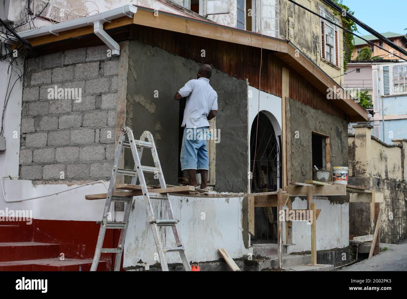 Building a house in Grenada Caribbean decorating plastering working ...