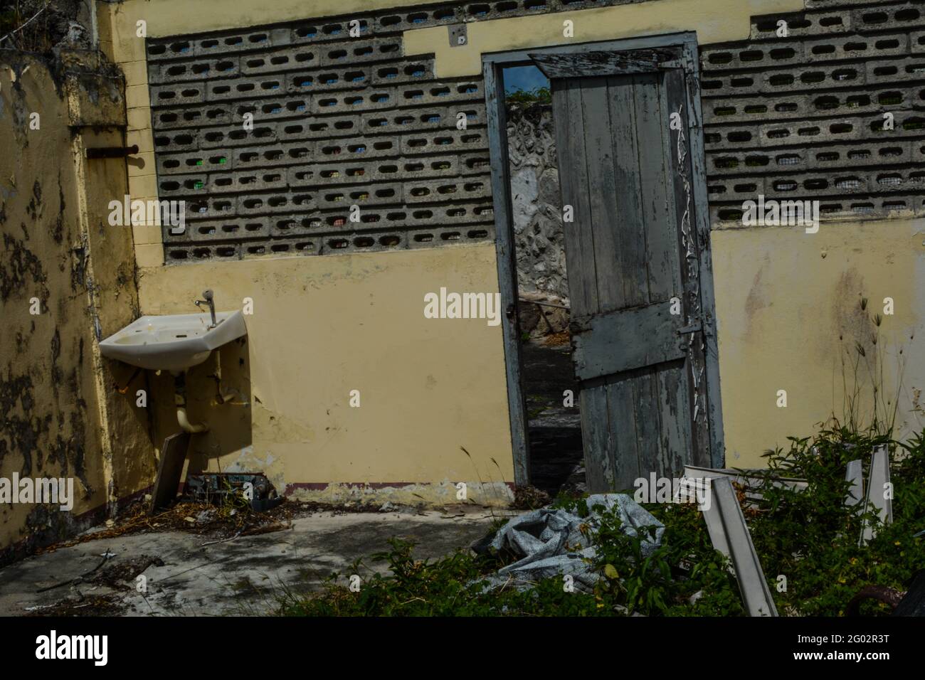 Ruined office at the fort Grenada Caribbean old broken door sink ...