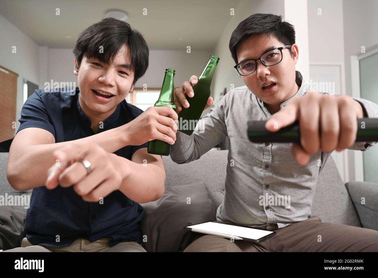 Two guys drinking beer on hi-res stock photography and images - Alamy