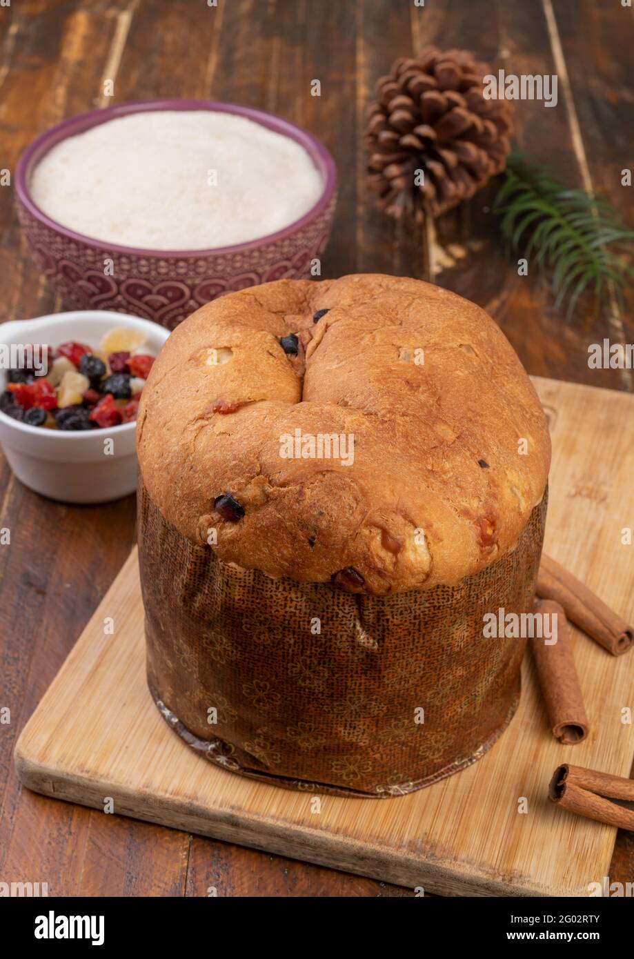 Traditional italian christmas fruit cake panettone with ingredients ...