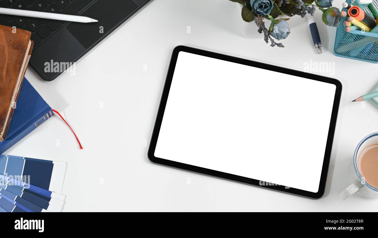Flat lay. Graphic designer work table with digital tablet, stationery ...
