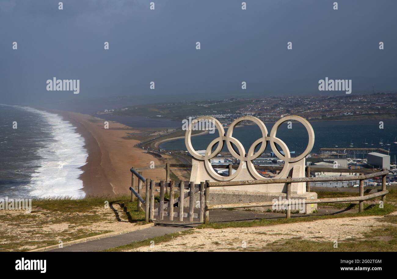 the olympic rings overlooking weymouth bay and chesil beach on the isle ...
