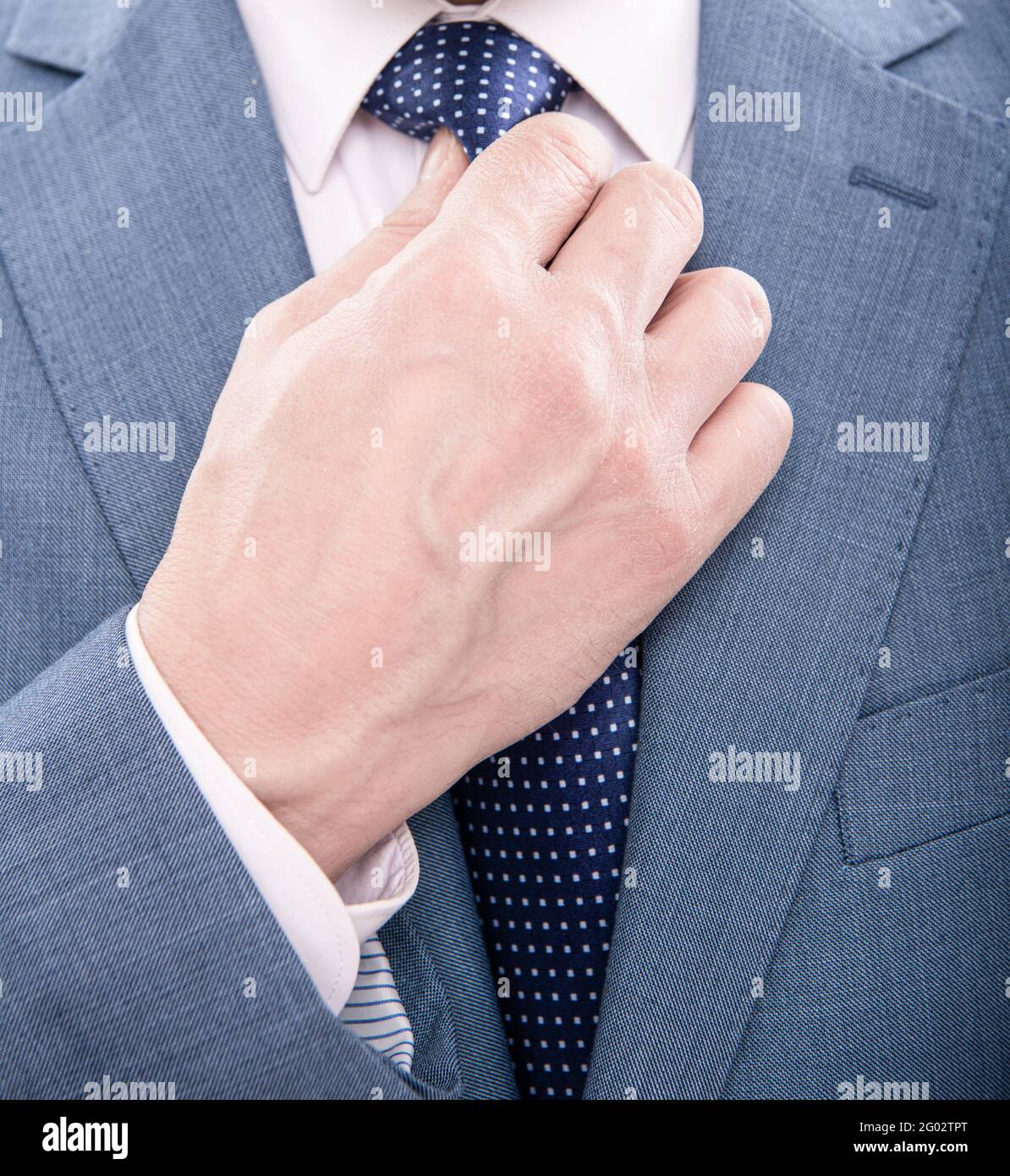 Hand to tie hi-res stock photography and images - Alamy