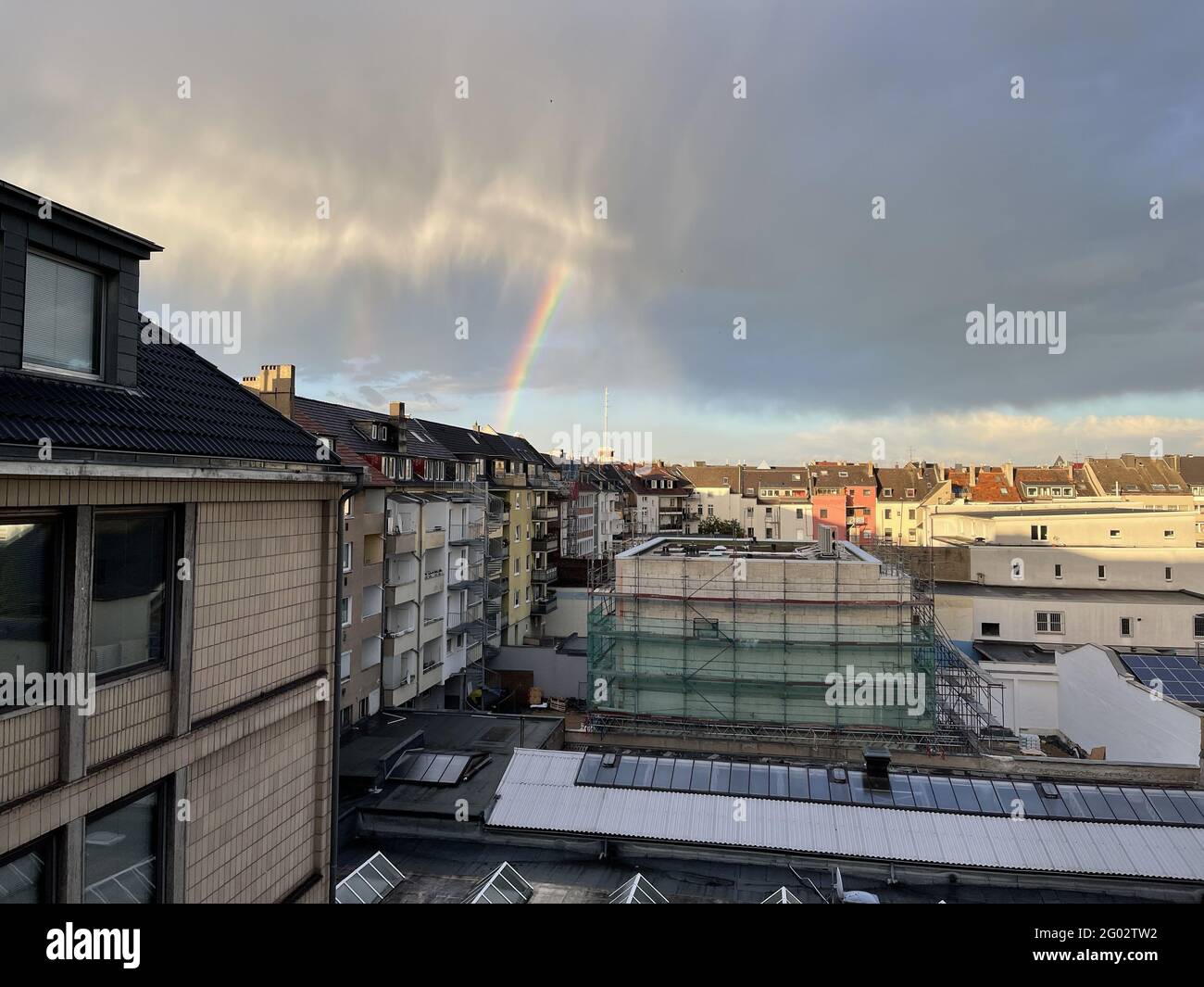 Rainbow over the buildings in Dusseldorf Stock Photo - Alamy