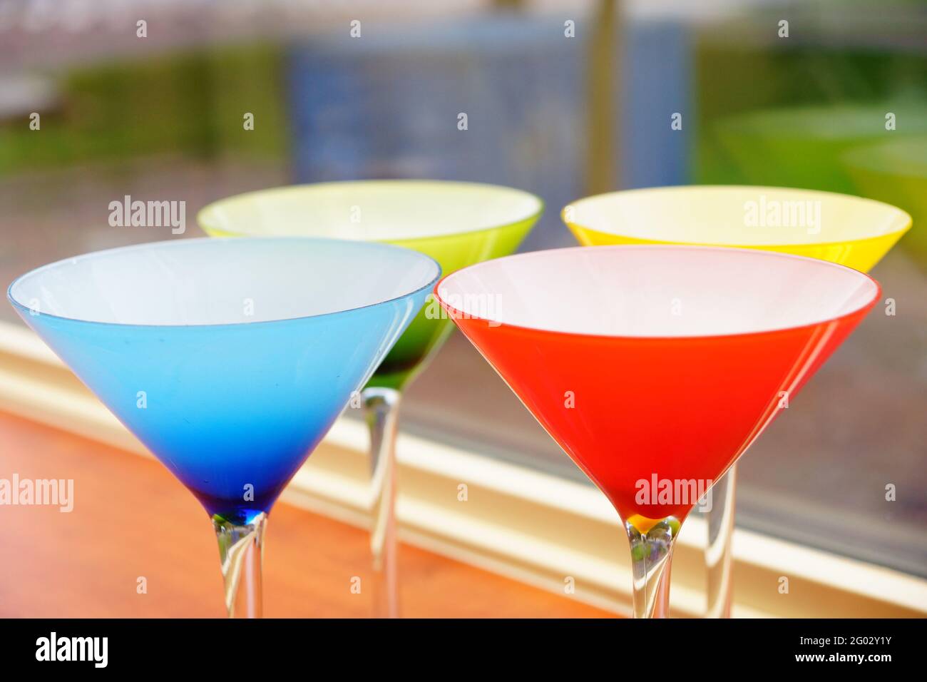 Cocktail glasses in various colors Stock Photo - Alamy