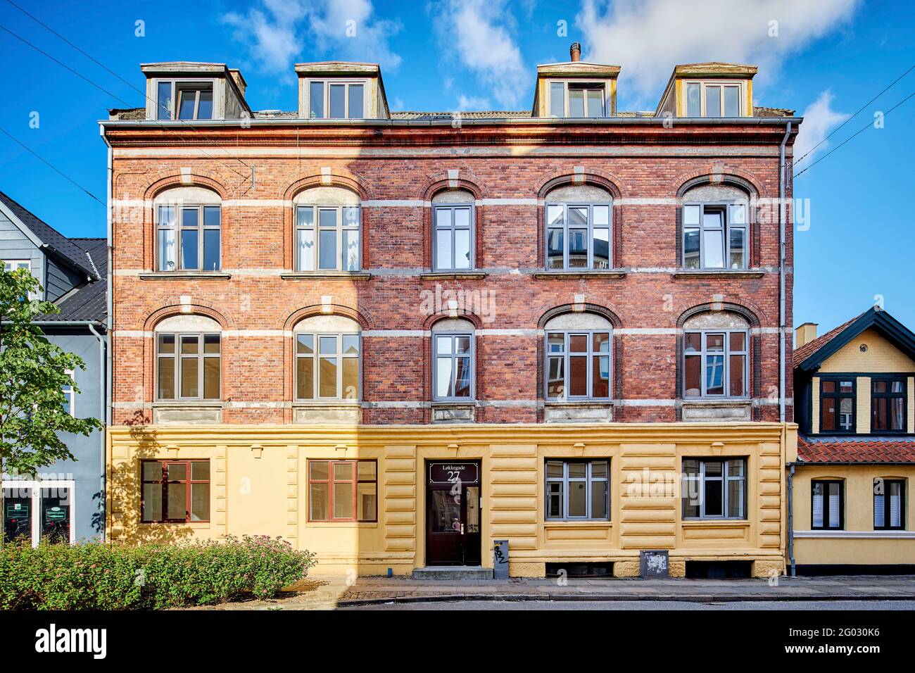 beautiful traditional danish building split in half by the sun Stock ...