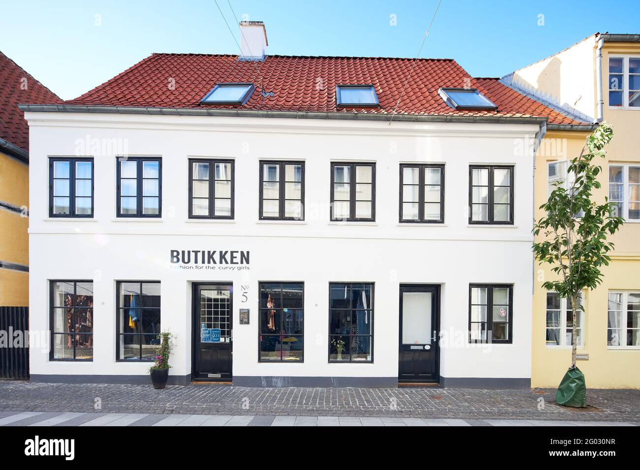 a small store building in the city in denmark Stock Photo - Alamy
