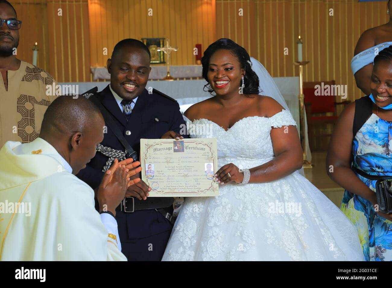 KAMPALA, UGANDA - May 31, 2021: The bride and the groom on their ...