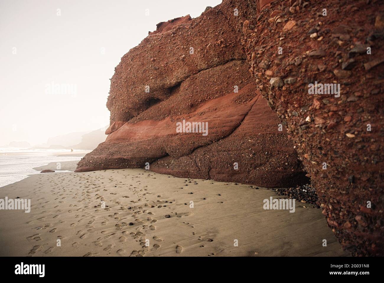 Legzira dramatic natural stone arches reaching over the sea, Atlantic ...