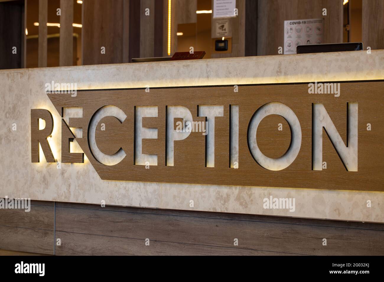 PAMPOROVO, BULGARIA - Mar 28, 2021: Clocks with different time zones on ...