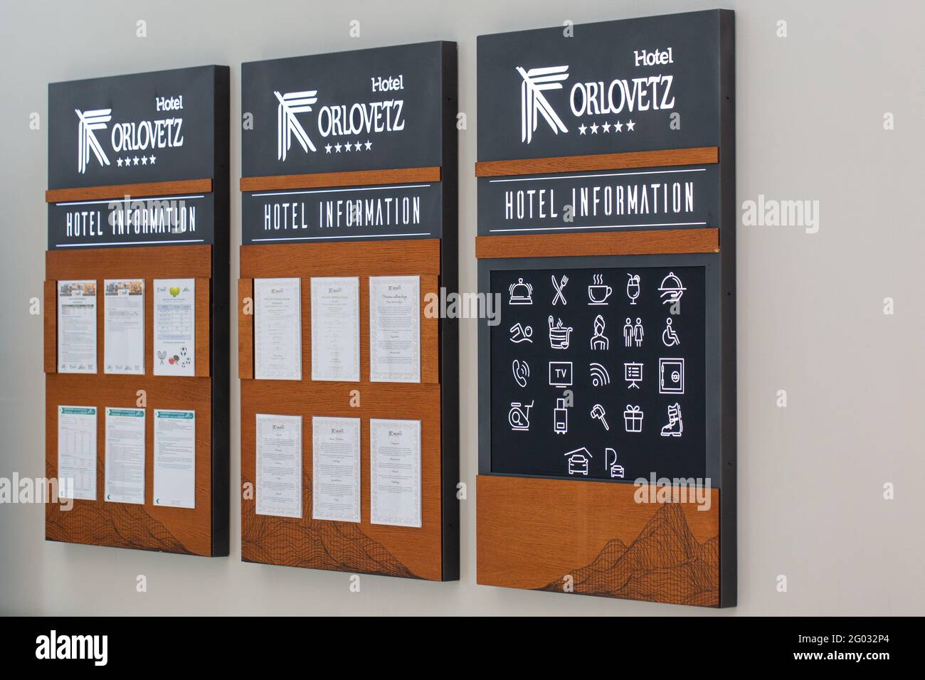 PAMPOROVO BULGARIA Mar 28 2021 Clocks With Different Time Zones On The Hotel Reception Wall pamporovo-bulgaria-mar-28-2021-clocks-with-different-time-zones-on-the-hotel-reception-wall