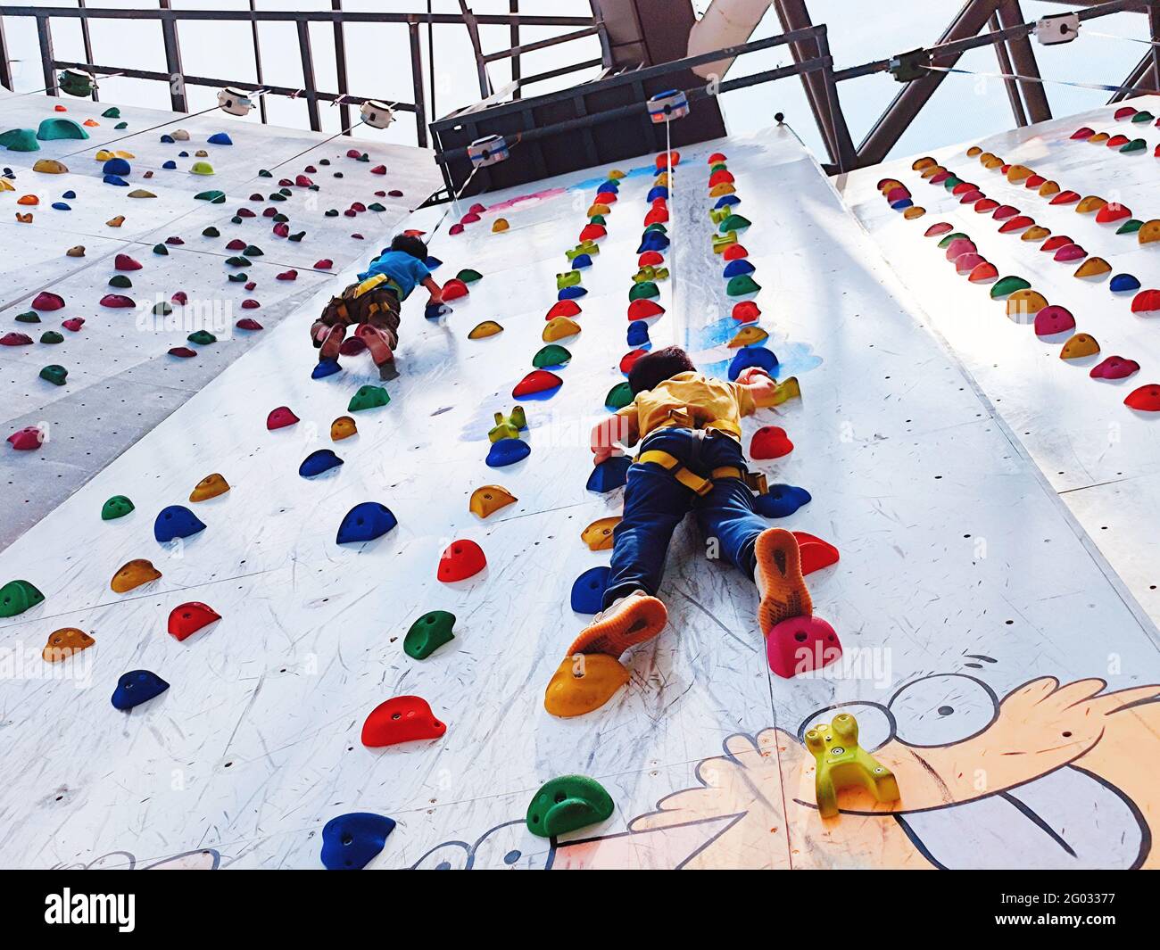 SHANGHAI, CHINA - MAY 30, 2021 - Children climb rocks at an indoor ...