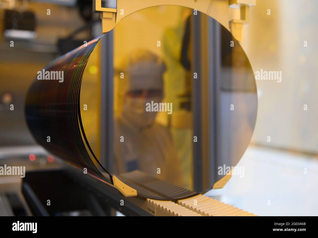 31 May 2021, Saxony, Dresden: An associate is reflected in a 300 ...