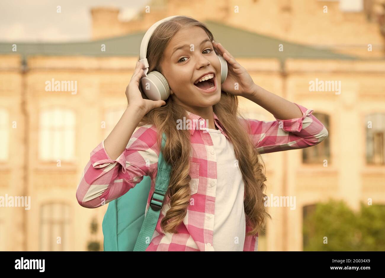 Singing lesson. Happy singer outdoors. Singing song. Little girl enjoy ...