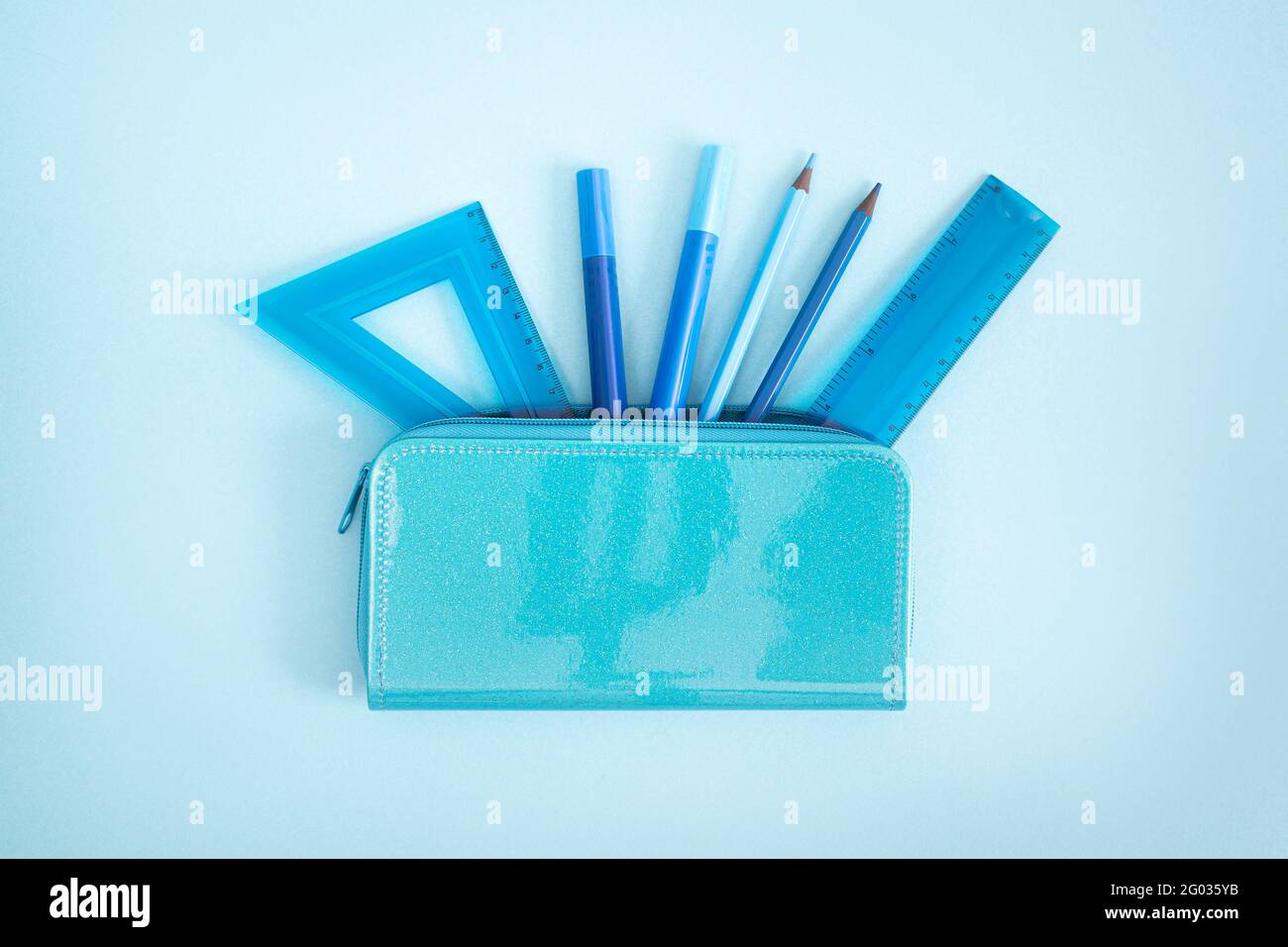 Blue stationery, school supplies on a blue background. Mockup, copy ...