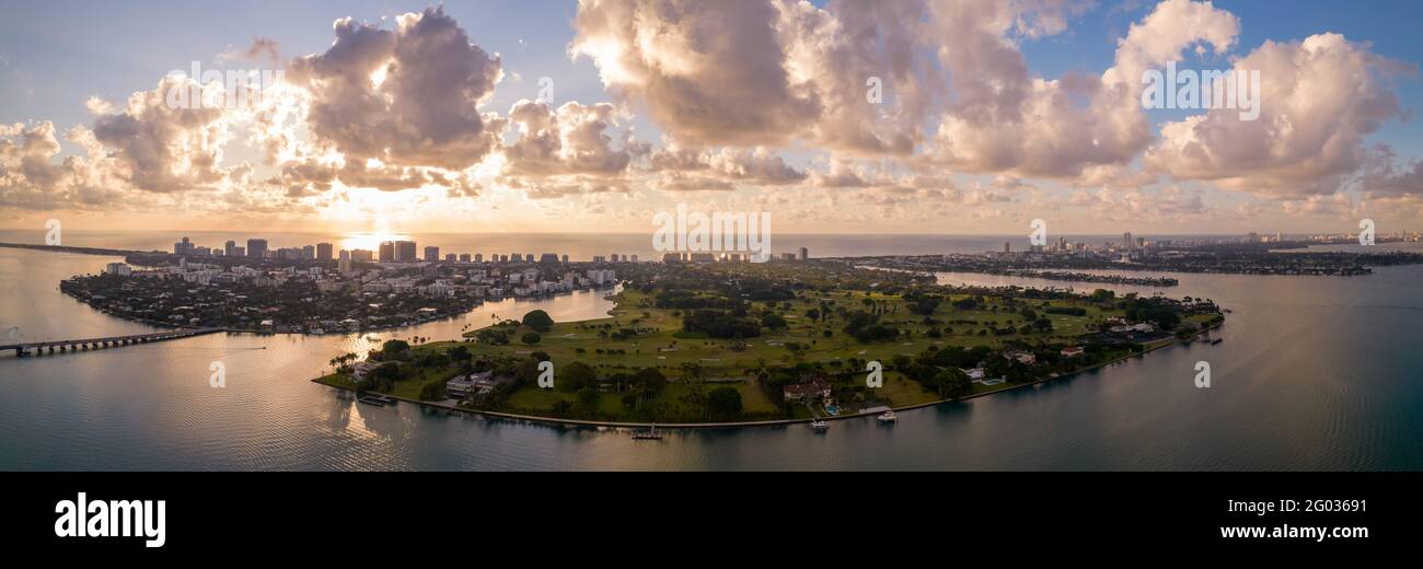 Beautiful sunrise over Miami aerial panorama facing east towards ocean ...