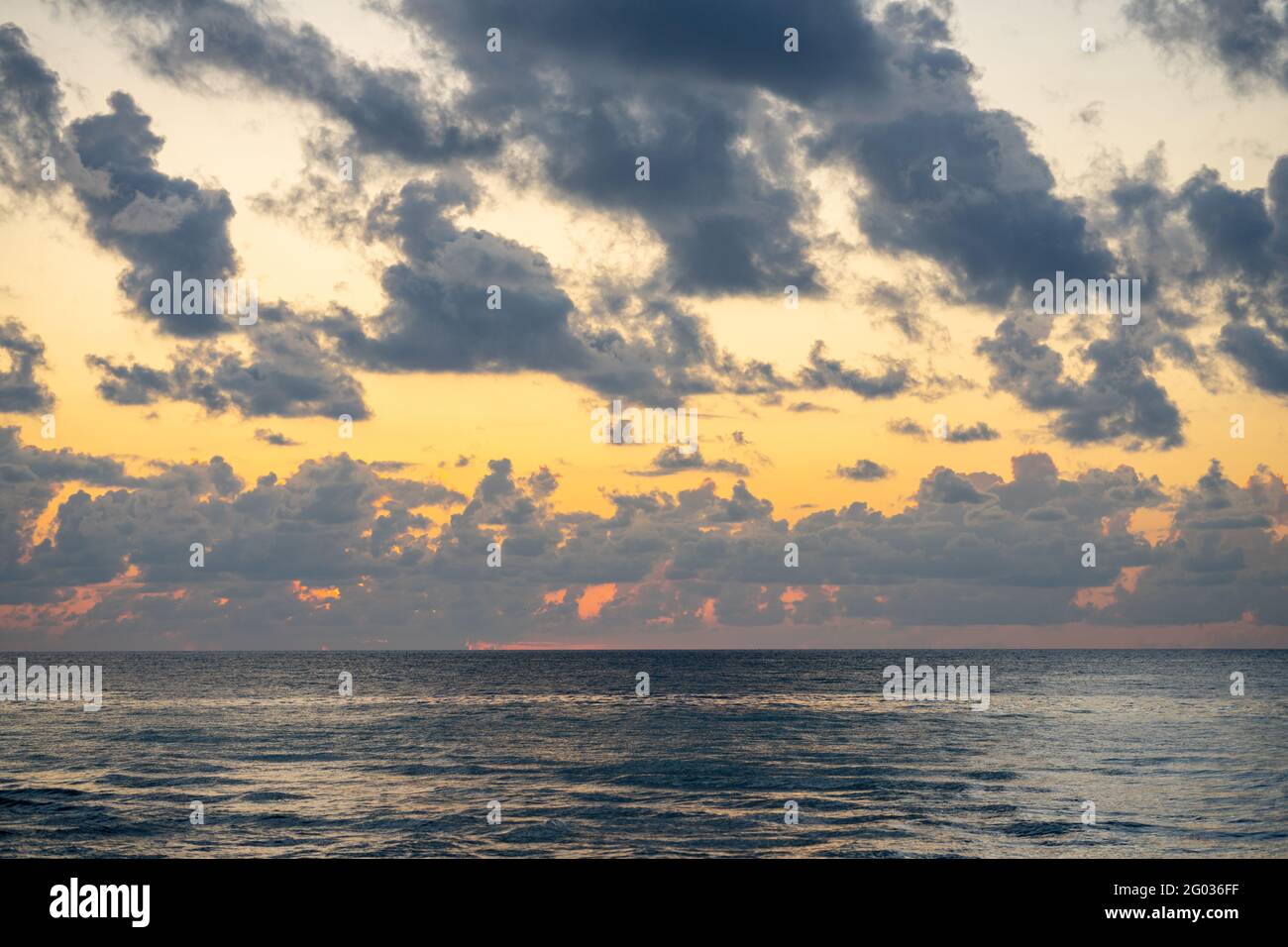 Sunrise over ocean nature landscape beautiful colors Stock Photo - Alamy