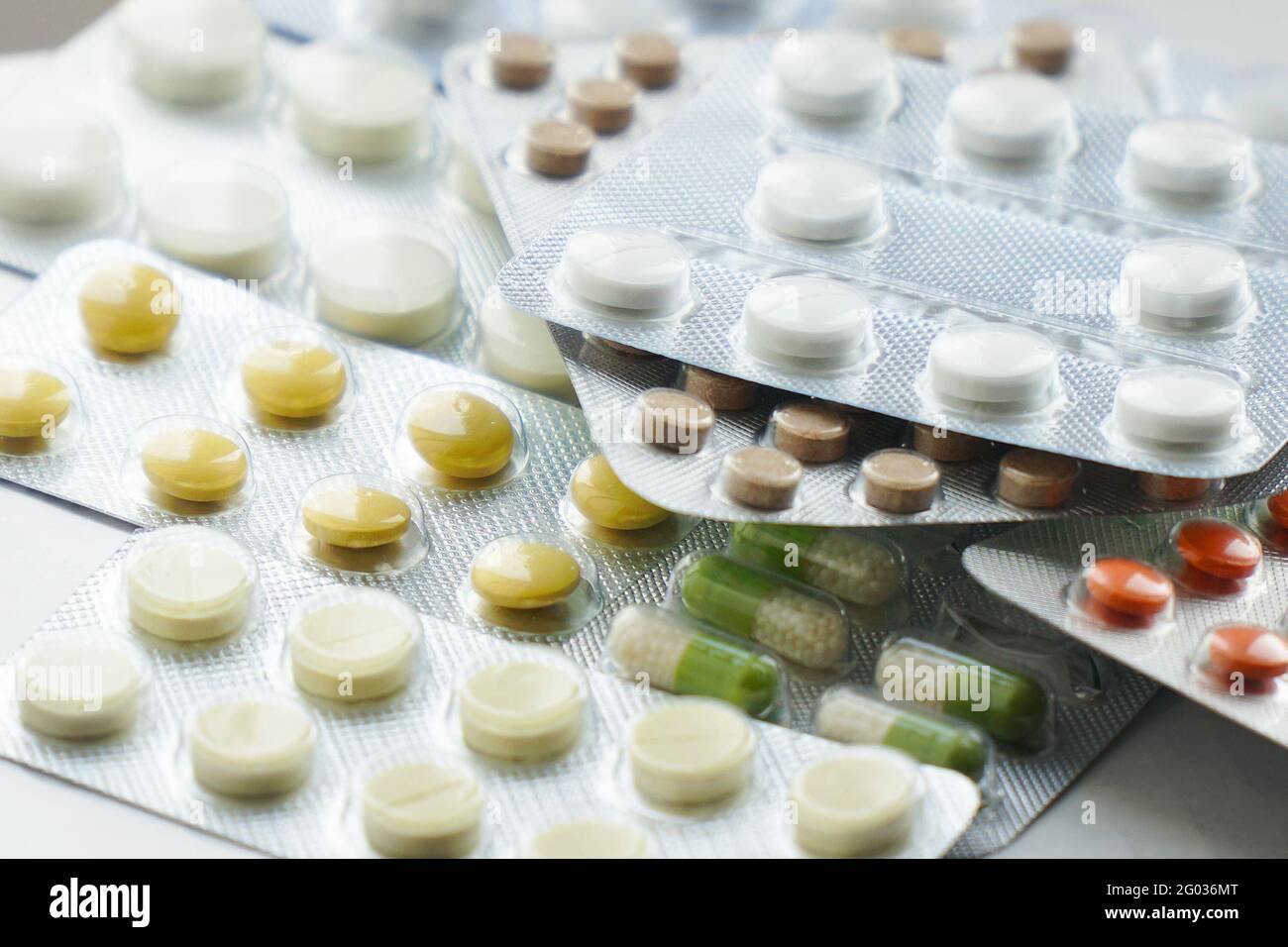 Overall view of pharmaceutical tablets and capsules in packages in ...