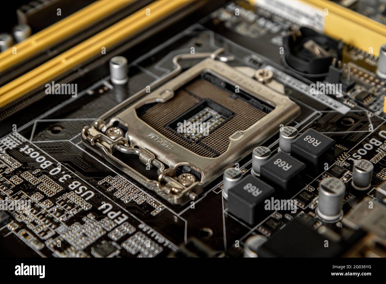 Part of the motherboard with a processor socket and other connectors to ...