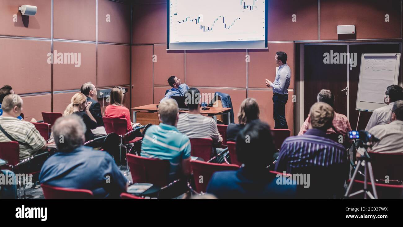 Business speaker giving talk at business conference event Stock Photo ...