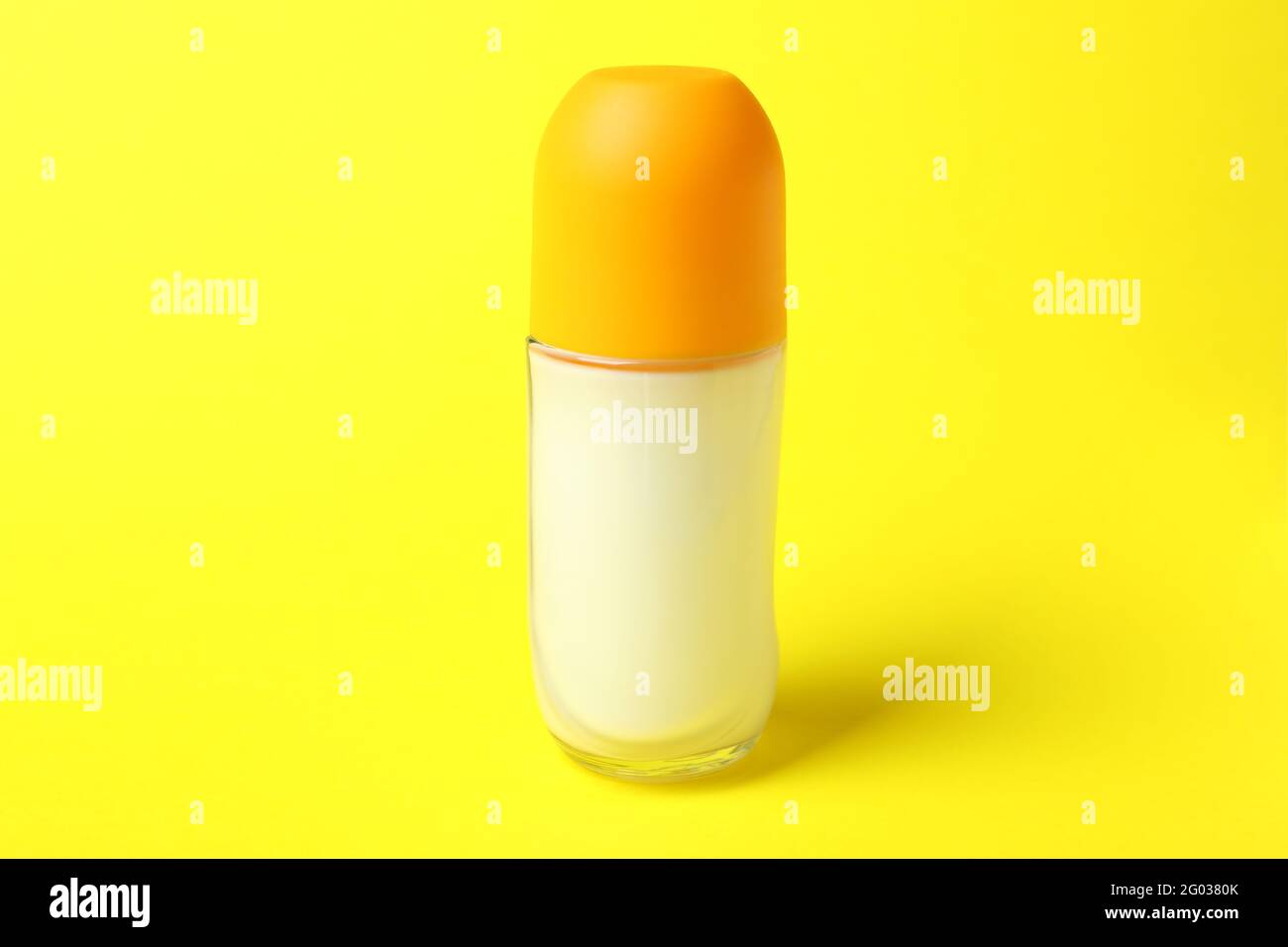 Blank roll-on deodorant on yellow background, space for text Stock ...