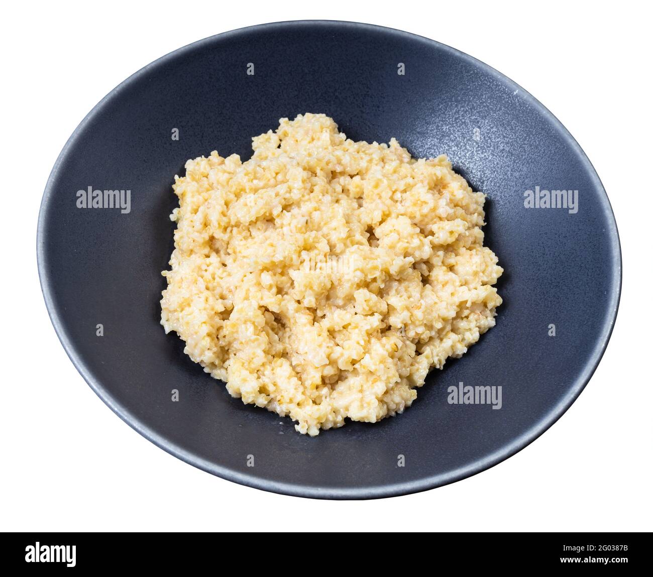 cooked porridge from crushed polished wheat in gray bowl isolated on ...