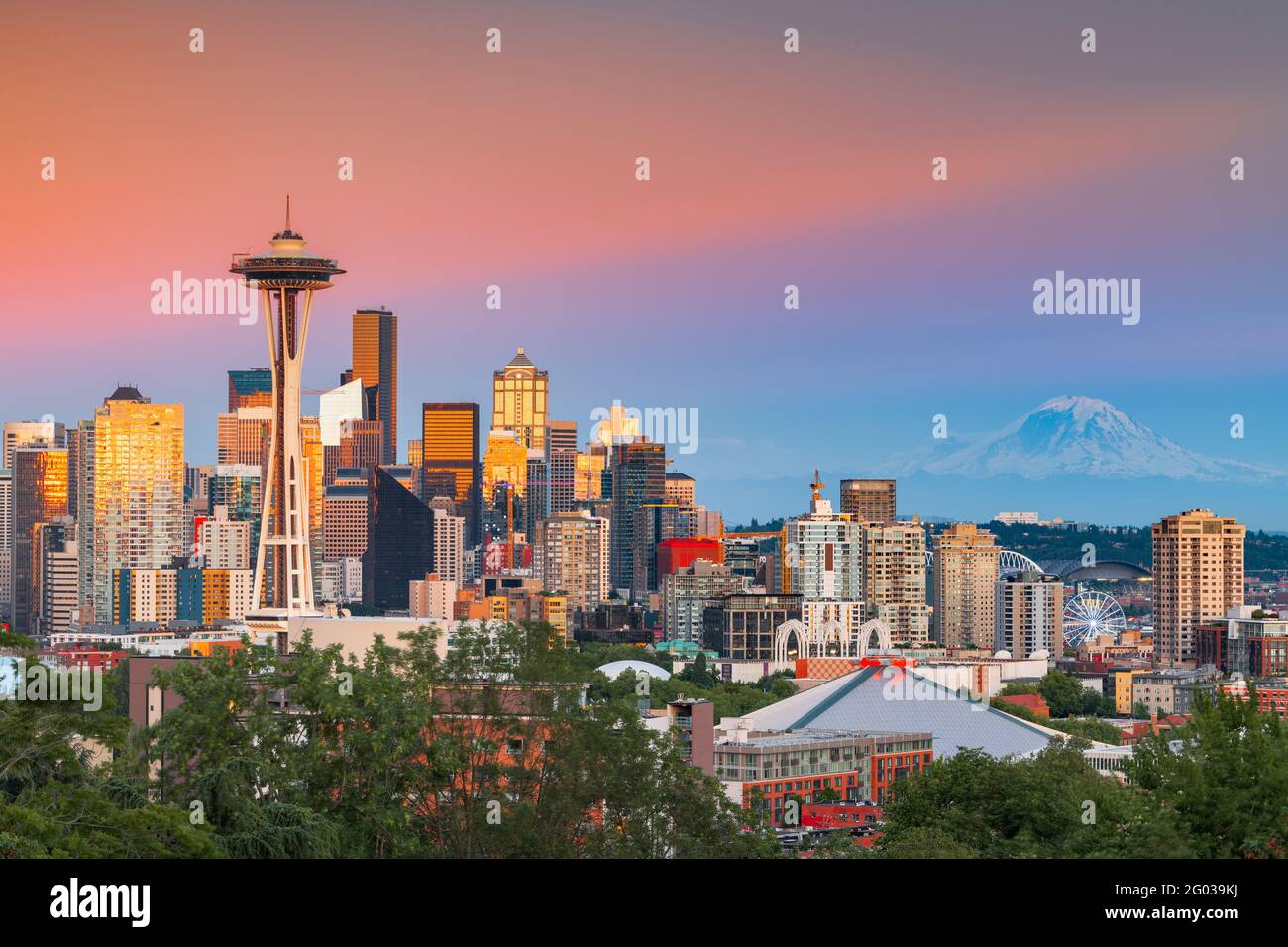 Seattle, Washington, USA downtown skyline at twilight with Mt. Rainier ...