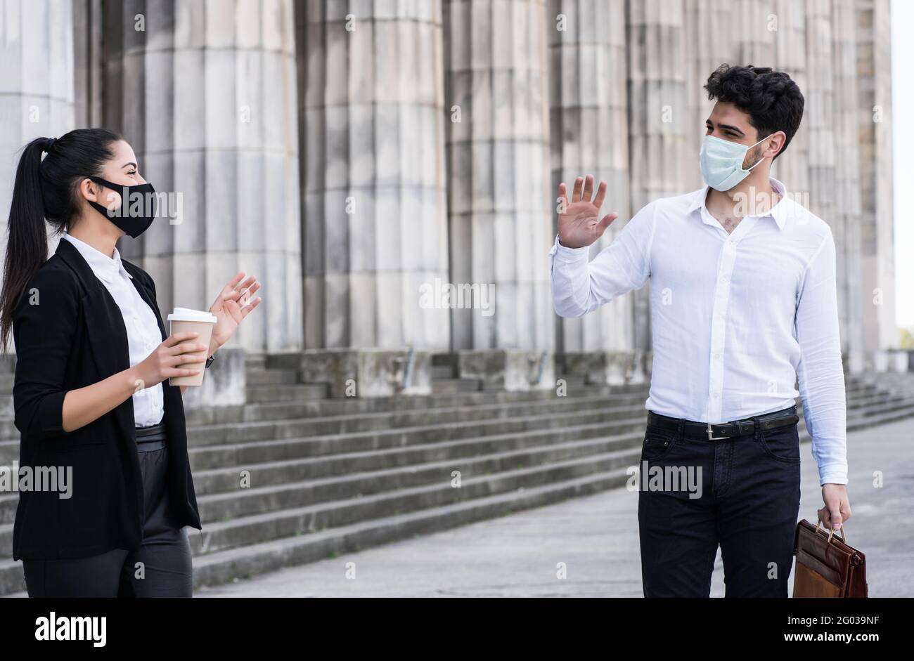 Business people keeping social distance Stock Photo - Alamy