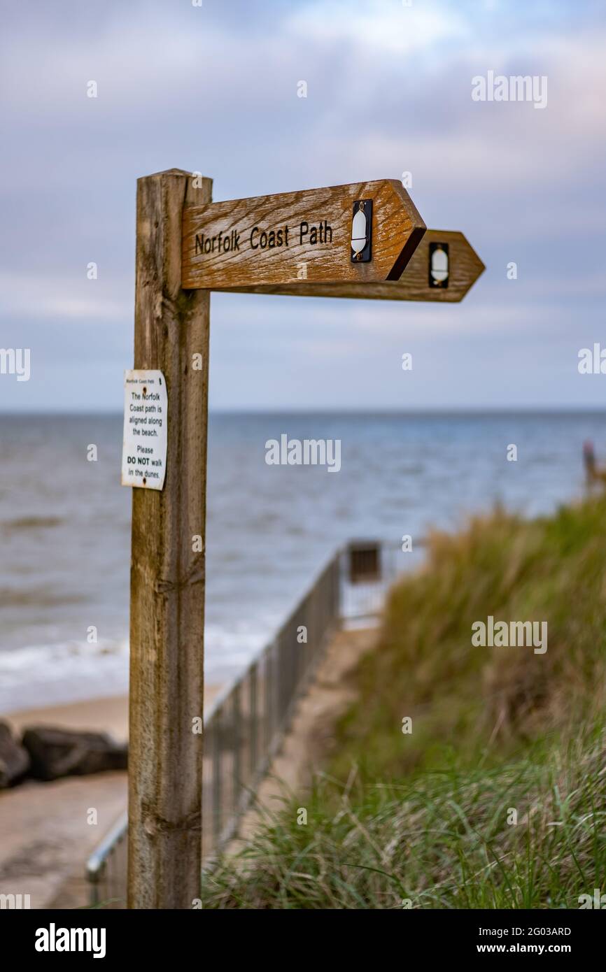 Norfolk Coastal path wooden sign Stock Photo - Alamy