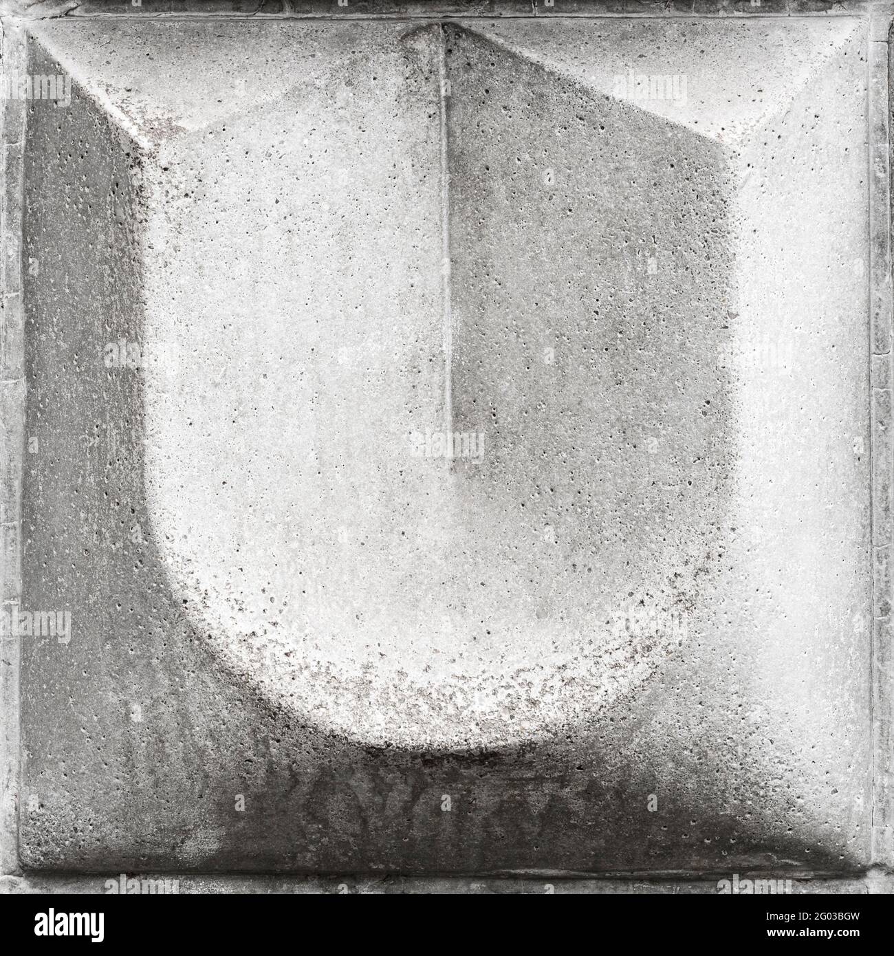 Letter U cast in concrete Stock Photo - Alamy