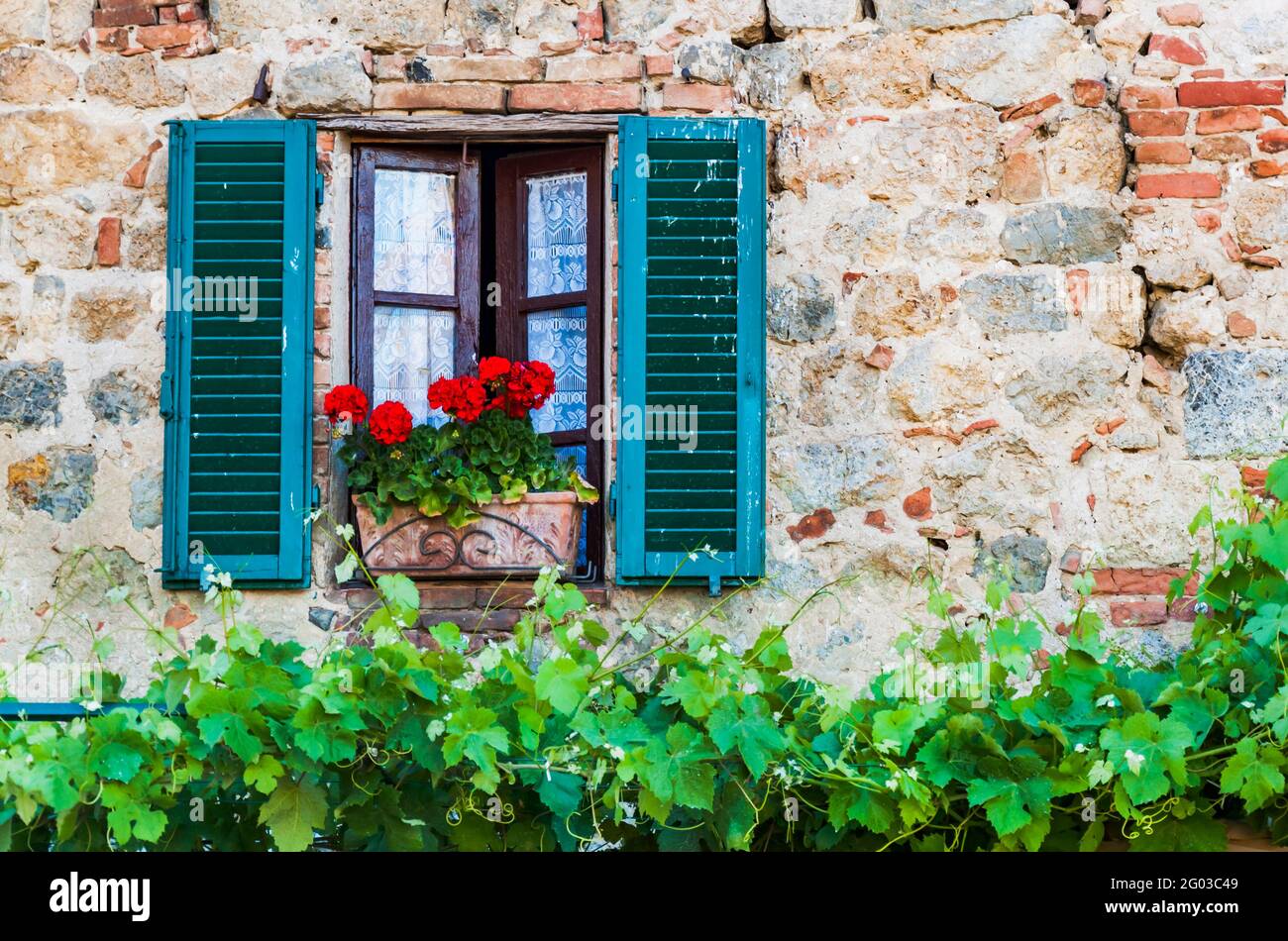 Old Italian window on a medieval building Stock Photo - Alamy