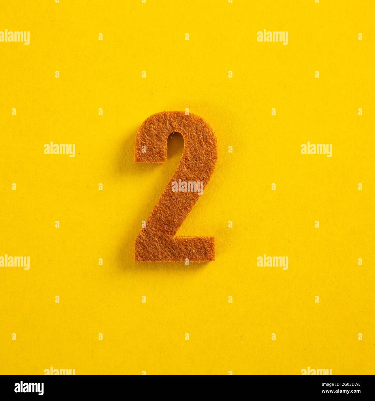 colorful number on yellow background Stock Photo - Alamy