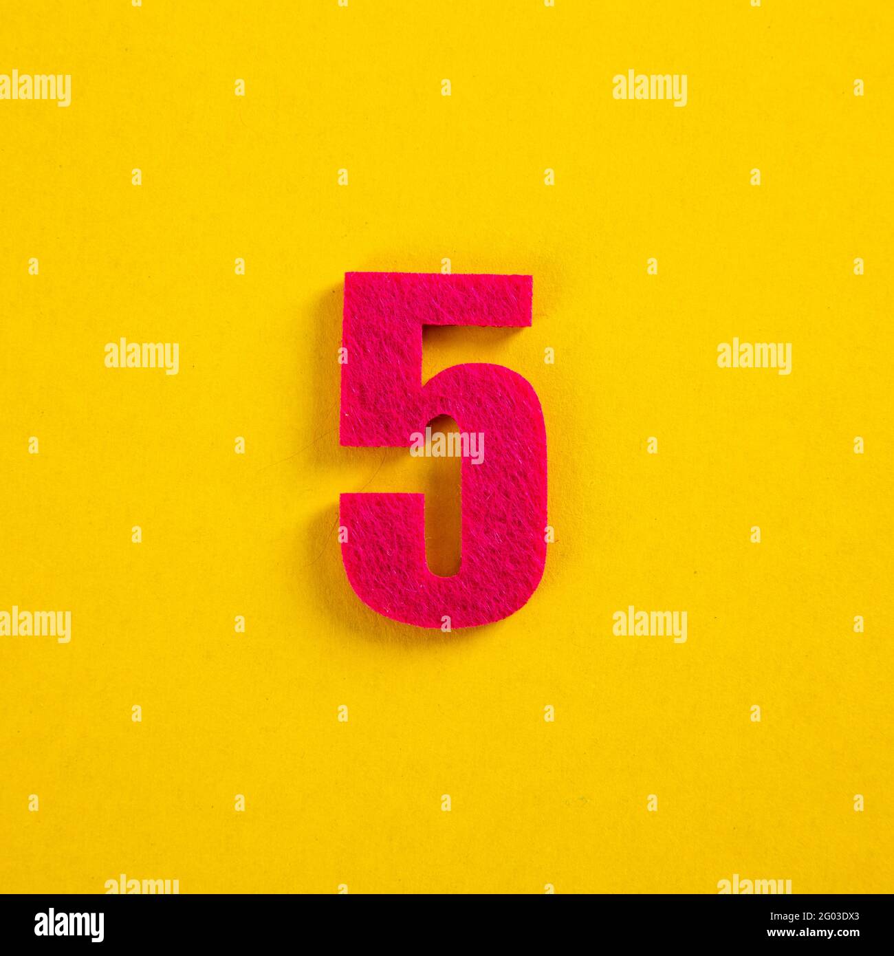 colorful number on yellow background Stock Photo - Alamy