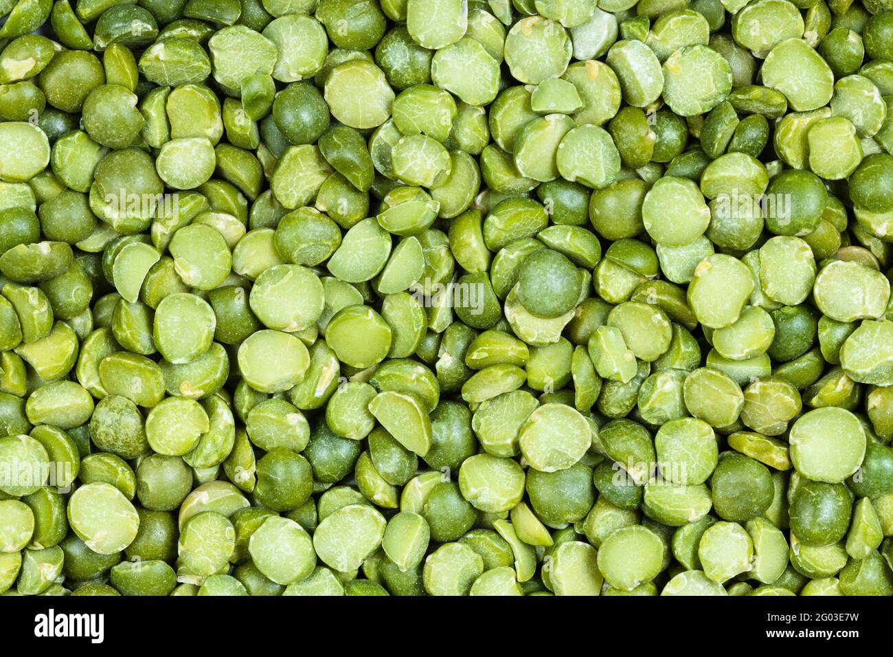 food background - raw dried green split peas Stock Photo - Alamy