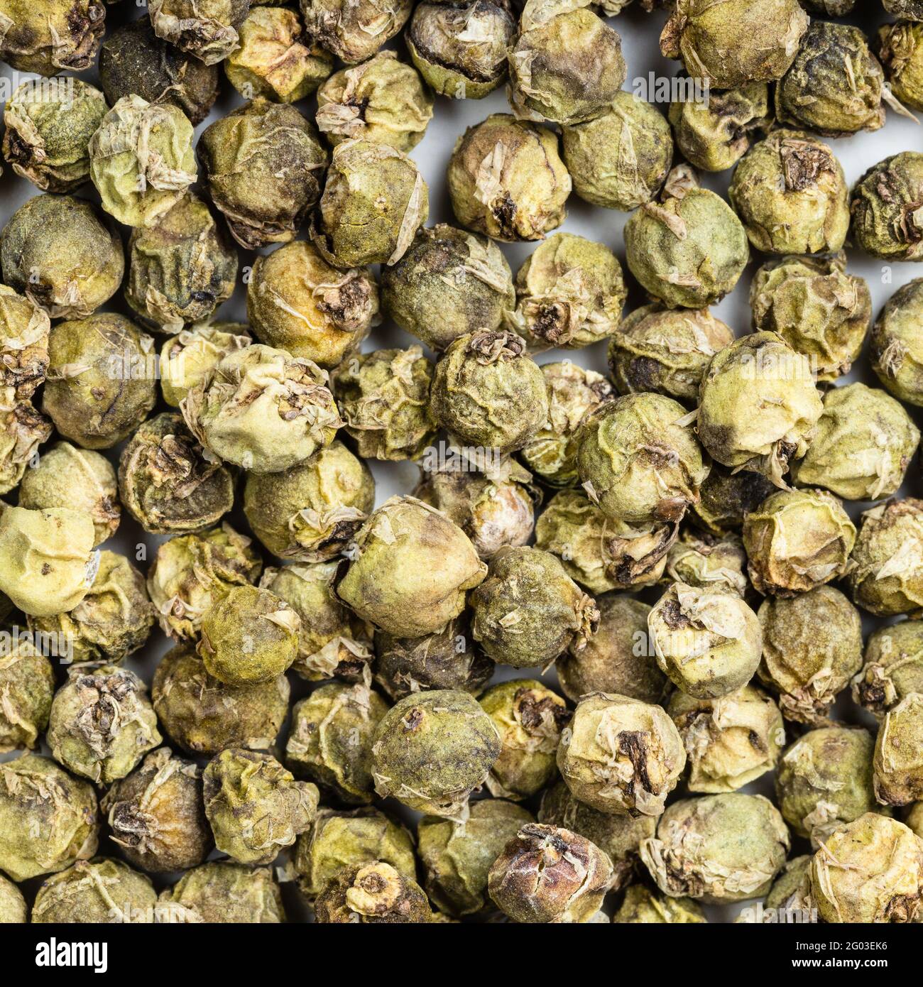 square food background - green pepper peppercorns close up Stock Photo ...